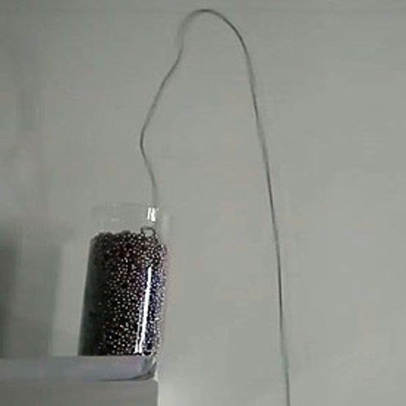 Physicists Explain "Gravity-Defying" Chain Trick - Scientific American